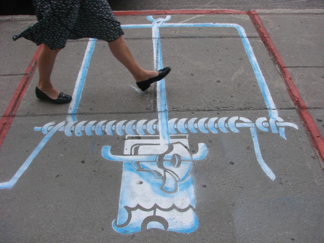 Artist Playfully Transforms Street Markings Into Works of Art