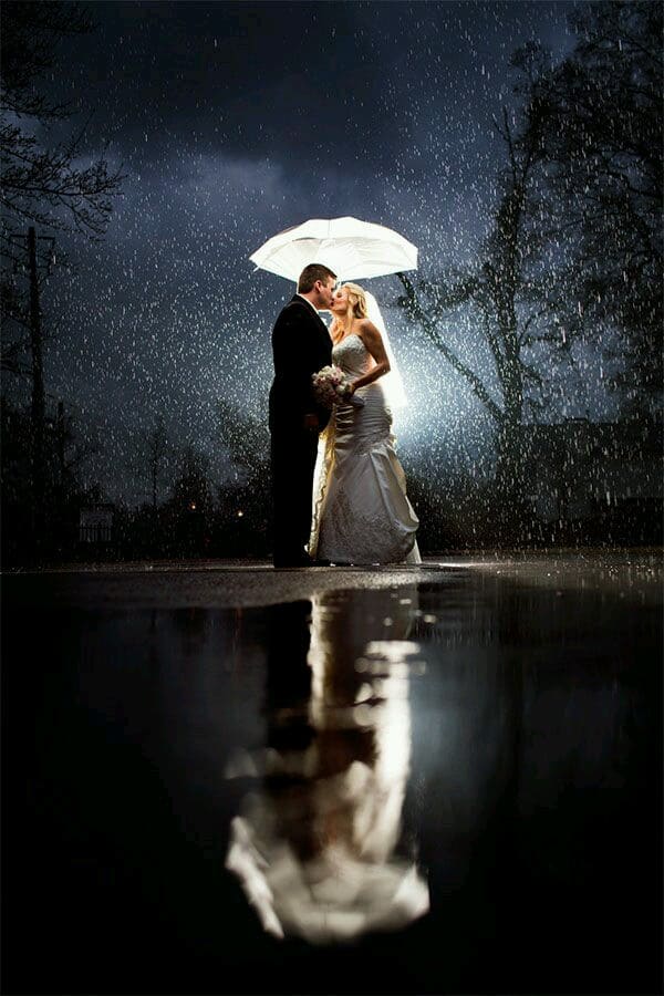 15 Bad Weather Wedding Photos That Are Beautifully Backlit | My Modern Met