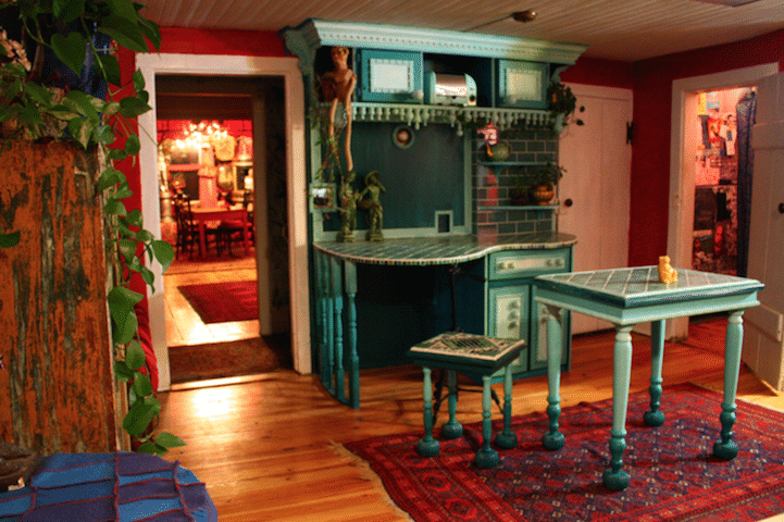 Artist's Quirky Rainbow-Colored House in the Woods