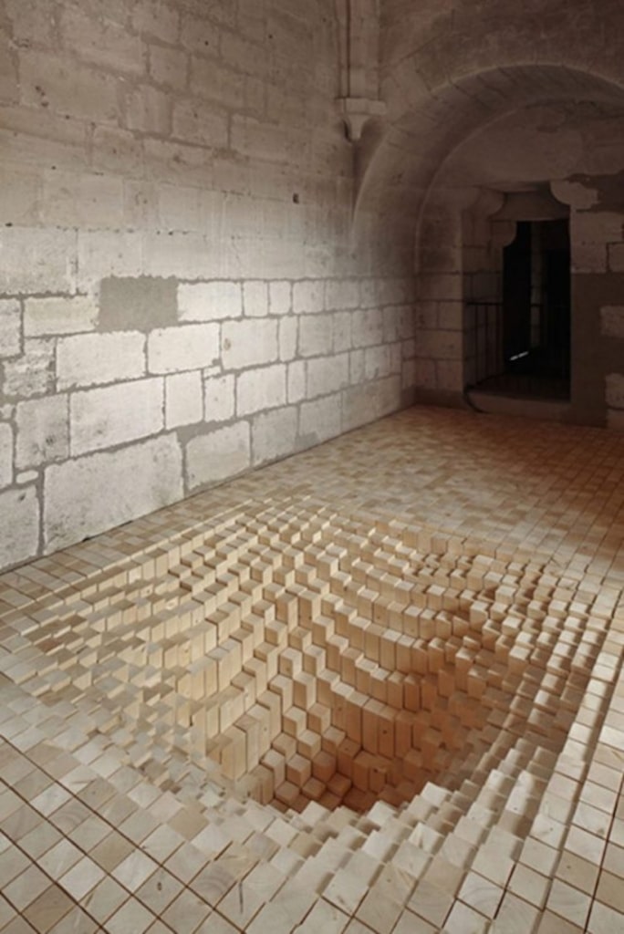 Sinking Floor Installation Looks Like an Endless Portal to the Upside ...