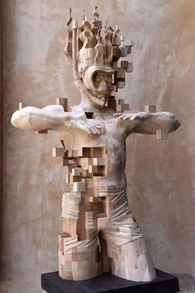 Masterfully Carved Wood Sculpture of a Submerged Man with a Pixelated ...