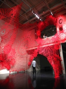 Growing Installation Art Fills Gallery Spaces With Giant Crochet Doilies