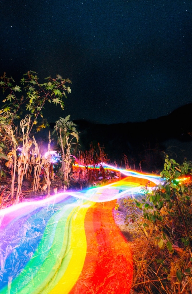 Vibrant Rainbow Roads Illuminate Forests and River Bends Into Magical ...