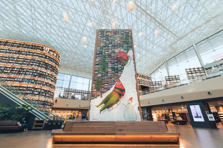 Painted Books: The Stacked Book Sculptures of Mike Stilkey