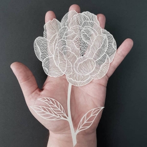 Artist Crafts Intricate Nature-Inspired Paper Cutting Art by Hand