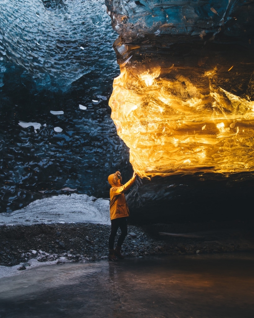 Iceland Ice Caves Lit Up Like a Piece of Amber in Photos by Sarah Bethea