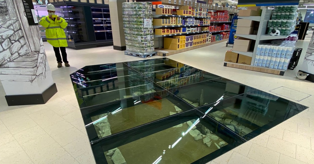 Shoppers Can Gaze Upon Medieval Viking Building Through A Glass Floor