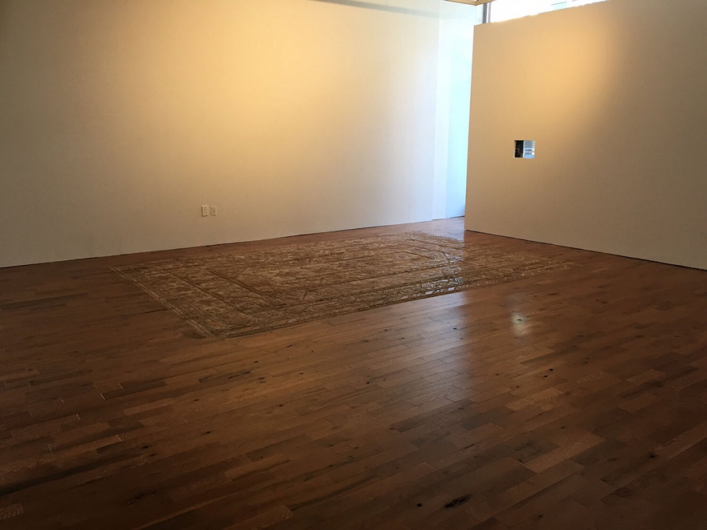 Artist Exposes Childhood Trauma By Carving a Rug into Wooden Floor