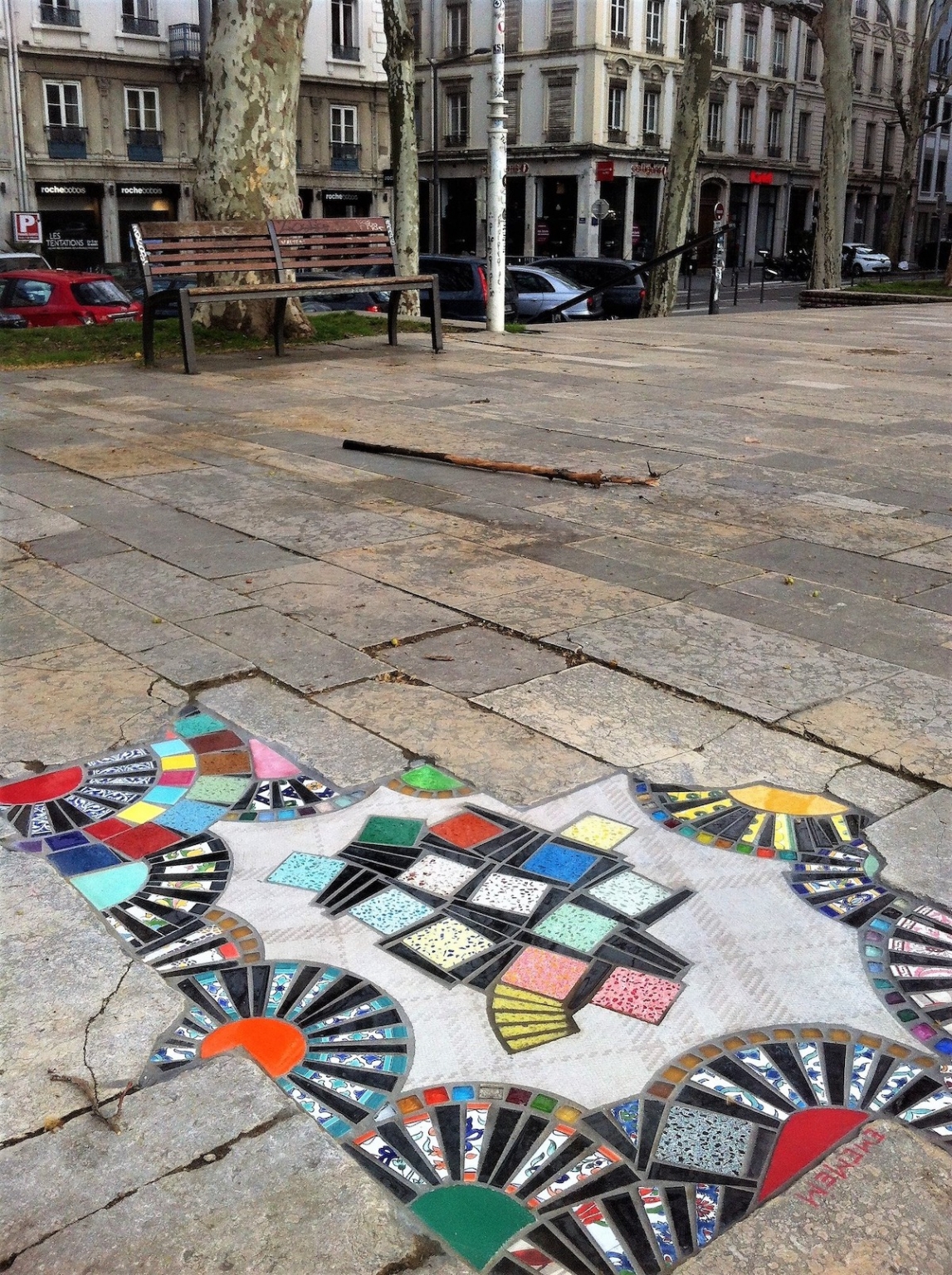 Street Artist Transforms Cracks in the Pavement Into Gorgeous Mosaics