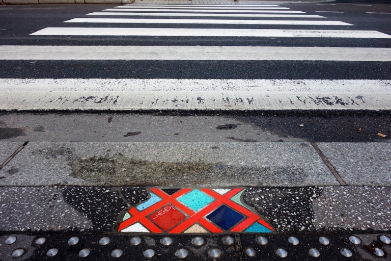 Street Artist Transforms Cracks in the Pavement Into Gorgeous Mosaics
