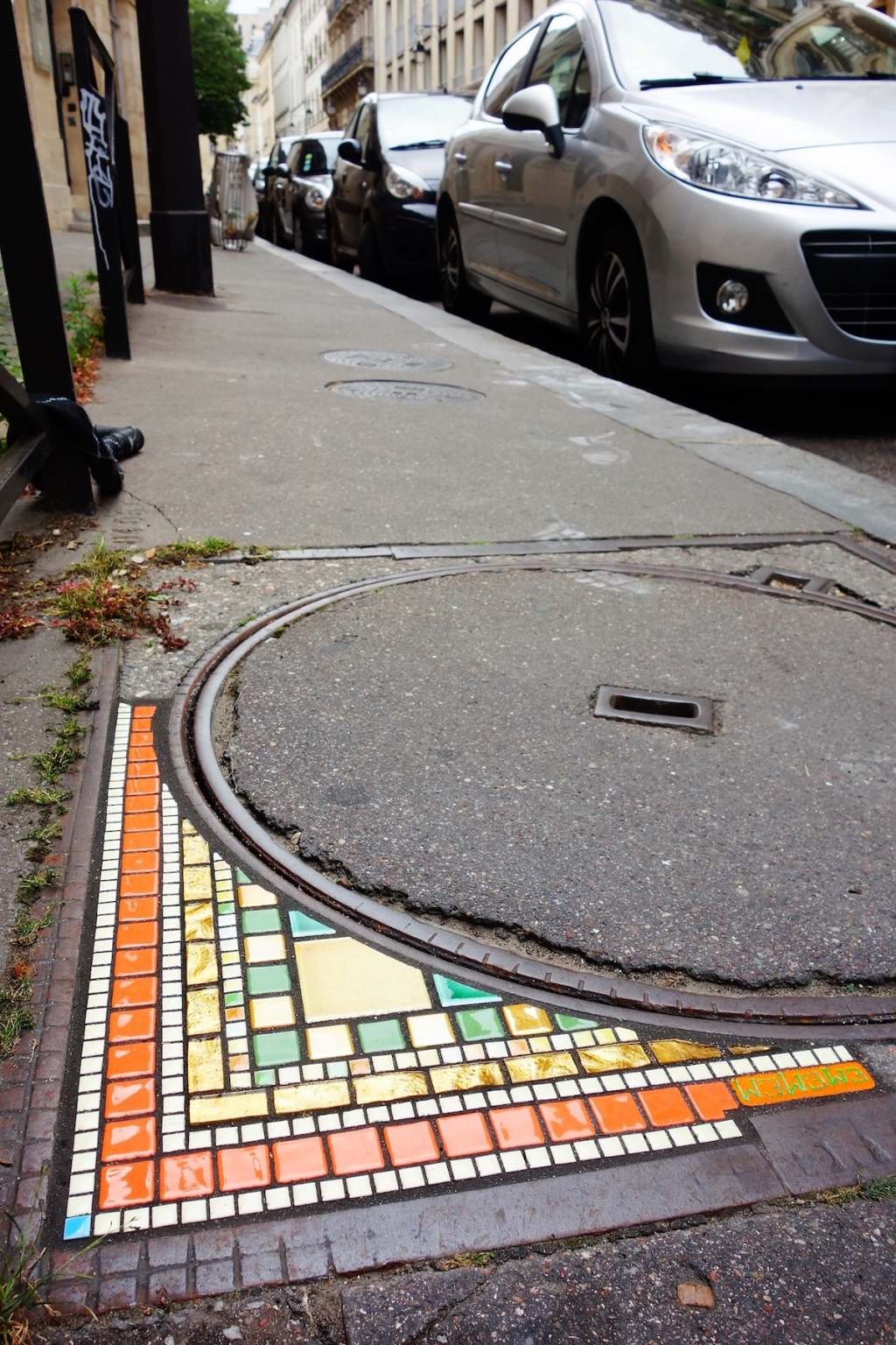 Street Artist Transforms Cracks in the Pavement Into Gorgeous Mosaics