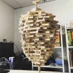 Guy Breaks His Own World Record for Balancing 1,512 Jenga on One