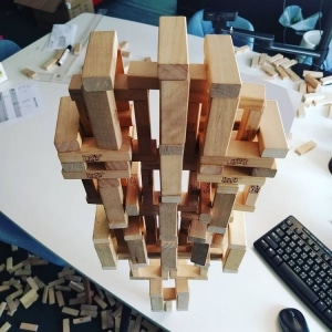 Guy Breaks His Own World Record for Balancing 1,512 Jenga on One