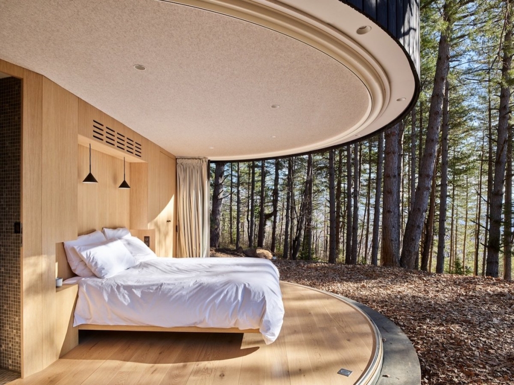 Circular Glass-Walled Cabin Easily Transforms From a Luxury Room Into ...