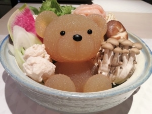 At Japanese Hot Pot Restaurant, Adorable Bear Takes a Dip in Hot Springs