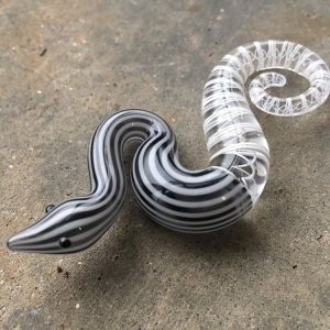 Artist Casts Small Multicolored Snake Figurines From Glass