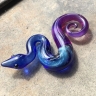 Artist Casts Small Multicolored Snake Figurines From Glass