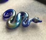 Artist Casts Small Multicolored Snake Figurines From Glass