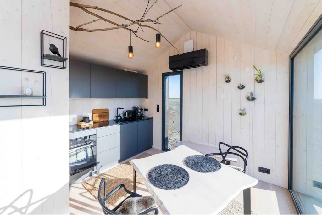 This Glass Cottage Airbnb Lets You Watch the Northern Lights in a Hot Tub