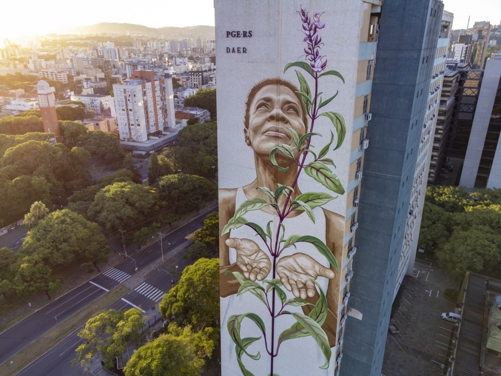 Giant Mural of Local Community Leader With a Symbolic Plant Promotes ...