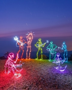 Skeleton "Ghost Bands" Light Paintings Pay Tribute to Late Musicians