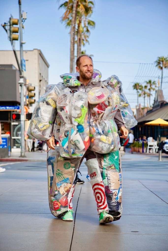Man Wears a Custom Suit Showing All the Trash He Produced in a Month