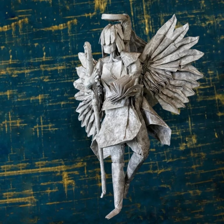 Artist Spent 15 Hours Folding Angel Origami From Single Sheet of Paper