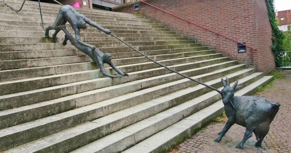 This Dynamic Life-Sized Sculpture Also Doubles as a Stairway Handrail