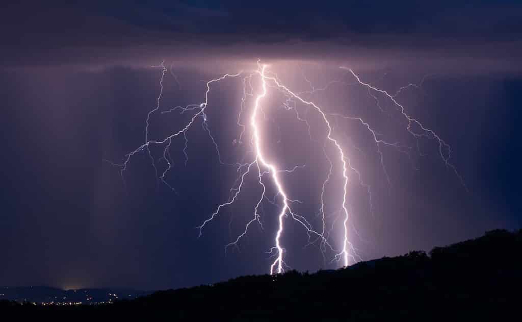 Stunning Photo of Lightning Bolt Framed by a Double Rainbow | My Modern Met