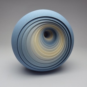 Ceramic Sculptures Contain Repeating Circular Forms