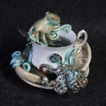 Artist Attaches Octopus Sculptures to Teacups and Saucers