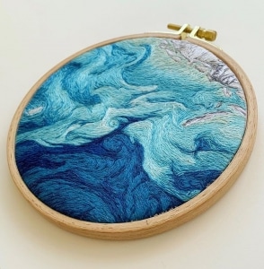 Aerial Embroidery Recreates the Swirling Beauty of NASA Imagery