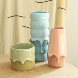 Colorful Thick Glazes Drips Down Playful Pieces of Pottery