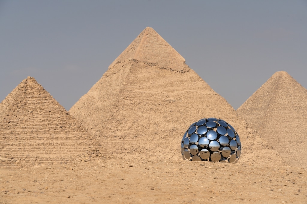 Dramatic Mirrored Orb Sits in Front of the Giza Pyramids