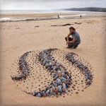 Artist Installs Mesmerizing Arrangements of Rocks on the Beach