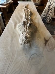 It Took 100 Hours for Woodworker to Create This Crocodile Bar Top
