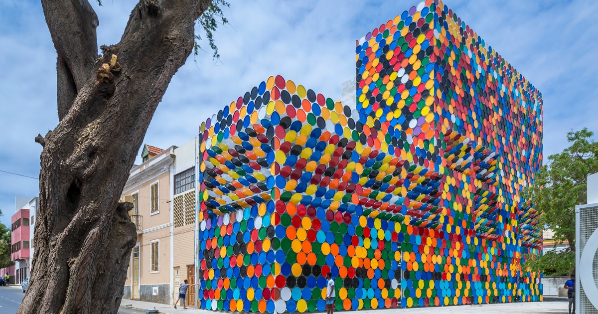 Unique Façade Created From Array of Recycled Barrel Lids