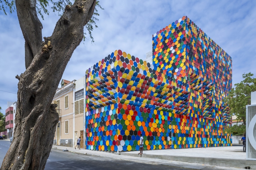 Unique Façade Created From Array of Recycled Barrel Lids