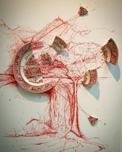 Artist Mends Broken Plates in Pen and Ink Drawings