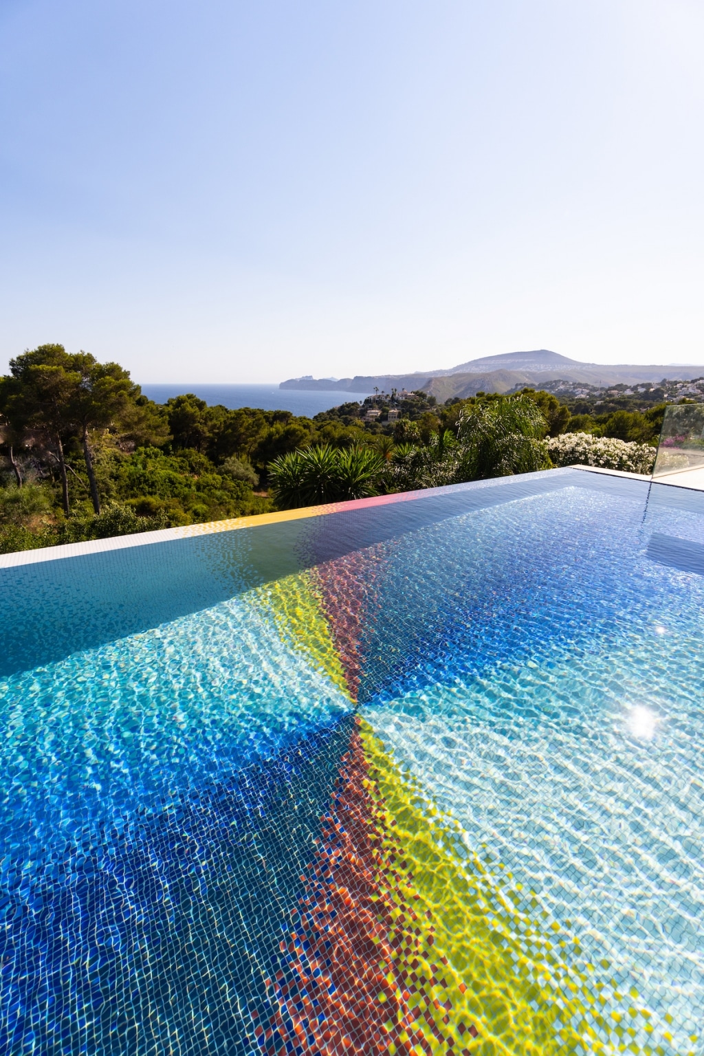Rainbow Swimming Pool Features 130,000 Glass Mosaic Tiles
