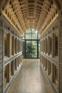 Eva Jospin's Cardboard Art Turns a Hallway Into a Cavern