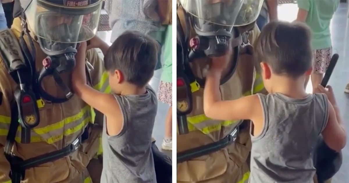 Firefighter Lets Blind 6-Year-Old "See" His Uniform in His Own Way