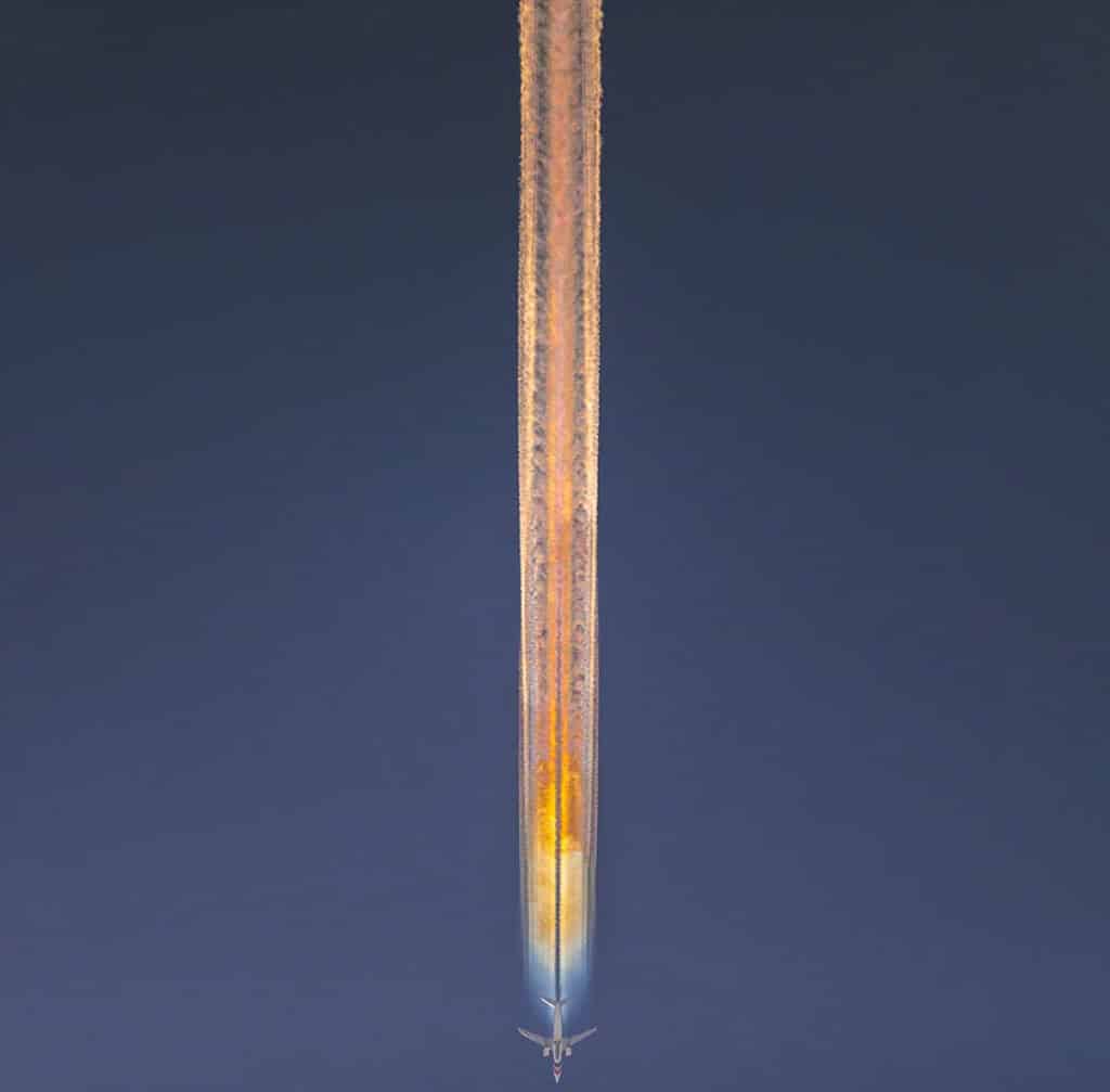 Rare Rainbow Contrails Emitted From Planes in the Sky