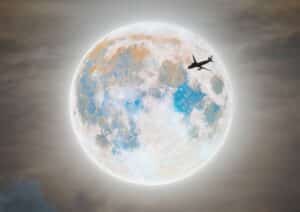 Incredible Photo of JetBlue Flight Passing Over Blue Supermoon