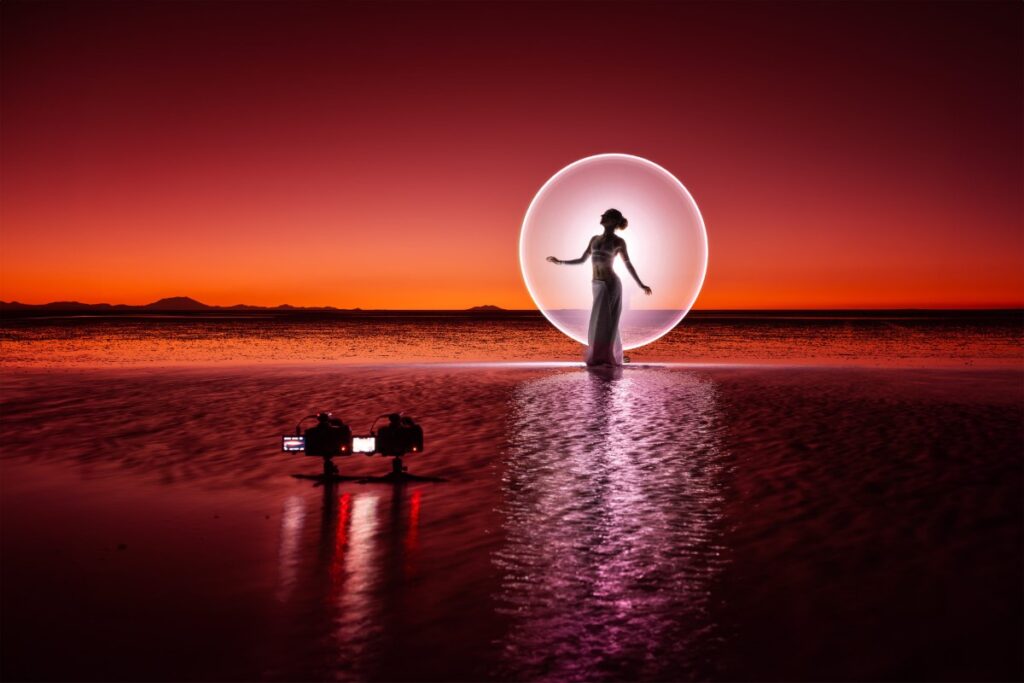 Striking Light Paintings Set Against a Fiery Red Sky at Bolivia’s Uyuni Salt Flat | My Modern Met