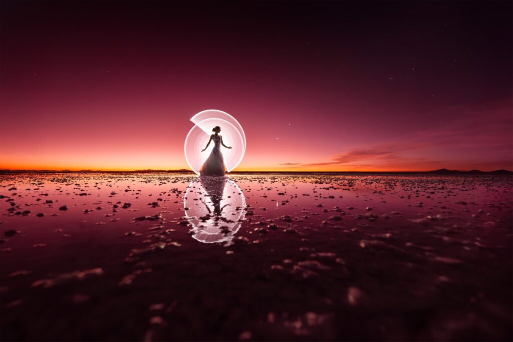 Striking Light Paintings Set Against a Fiery Red Sky at Bolivia’s Uyuni ...