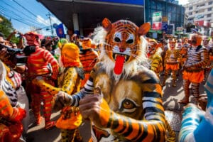 Performers Dressed as Tigers Celebrate Puli Kali in India
