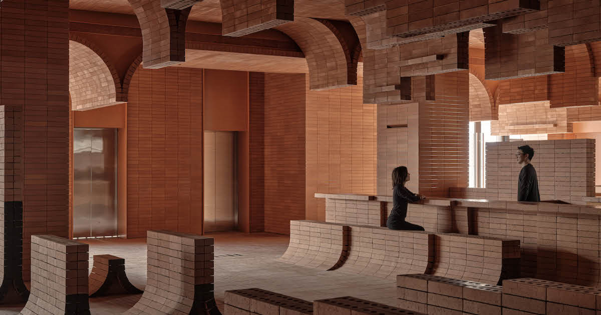 Cinema-Coffee Bar Reimagines Bricks as Rolling Ocean Waves