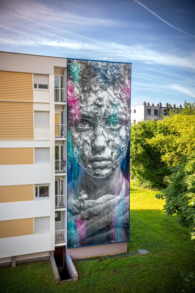 Vibrant Mural Blends Fragility and Renewal Through Floral Motifs